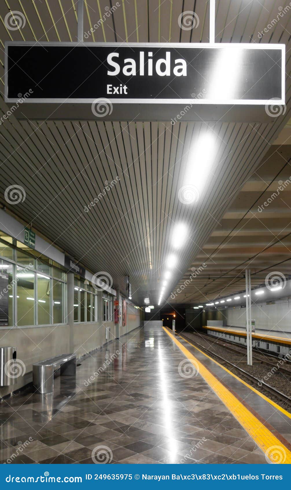 Exit Sign in Spanish and English at the Train Station, Exit Concept ...