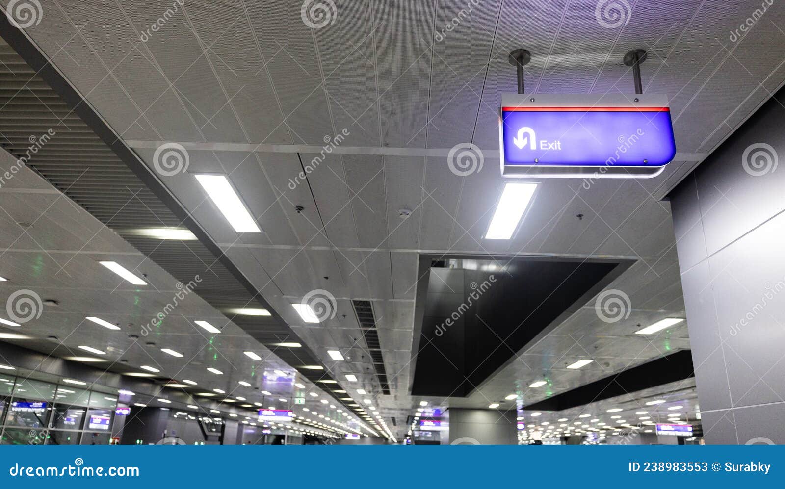 Exit Sign on the Wall of Subway Building Taken with Wide-angle Lens ...