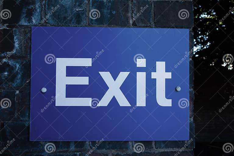 Exit Sign in White Lettering on Blue Stock Image - Image of sign ...