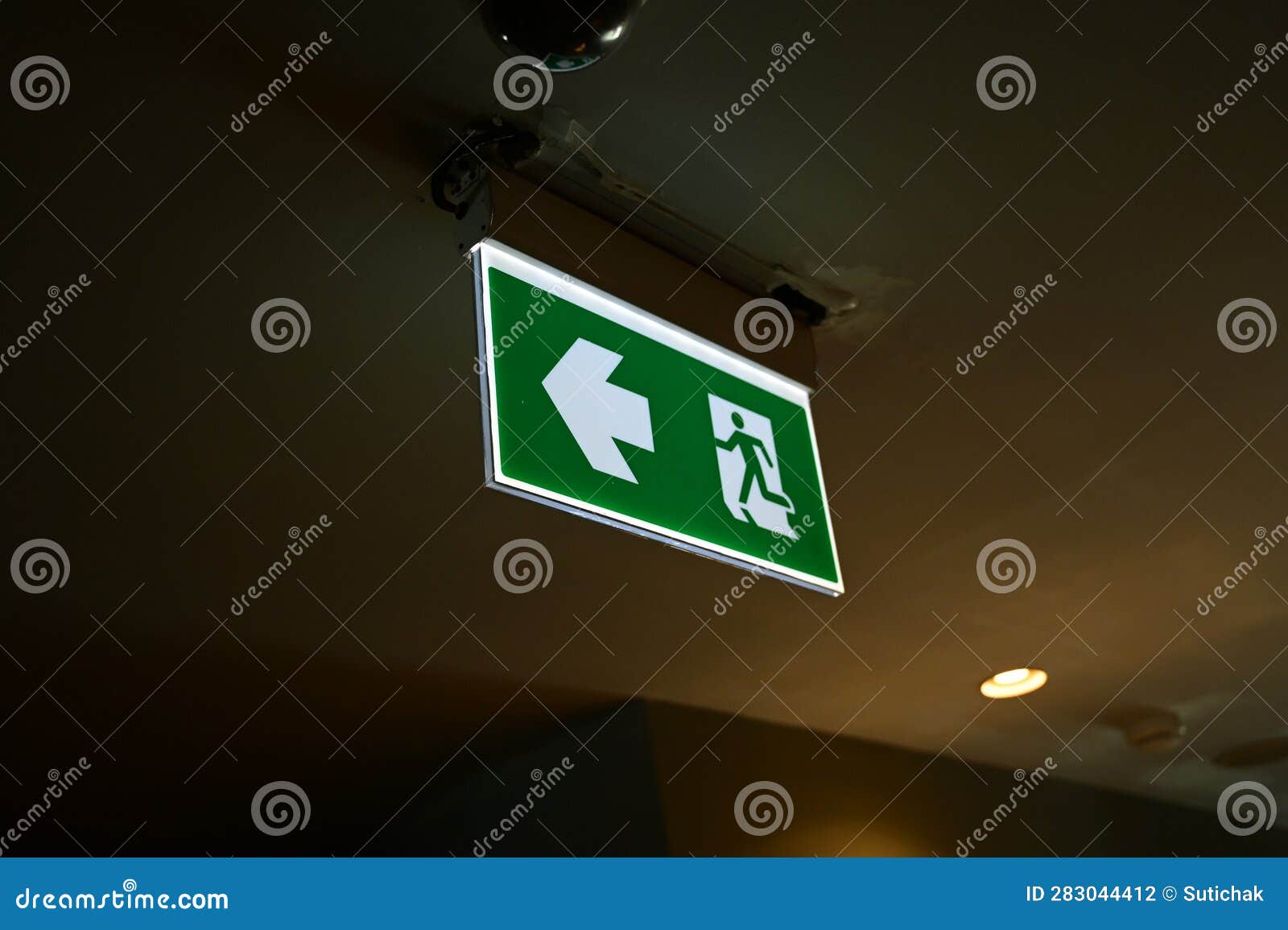 Exit Symbol for Warning People, Green Light Stock Photo - Image of ...