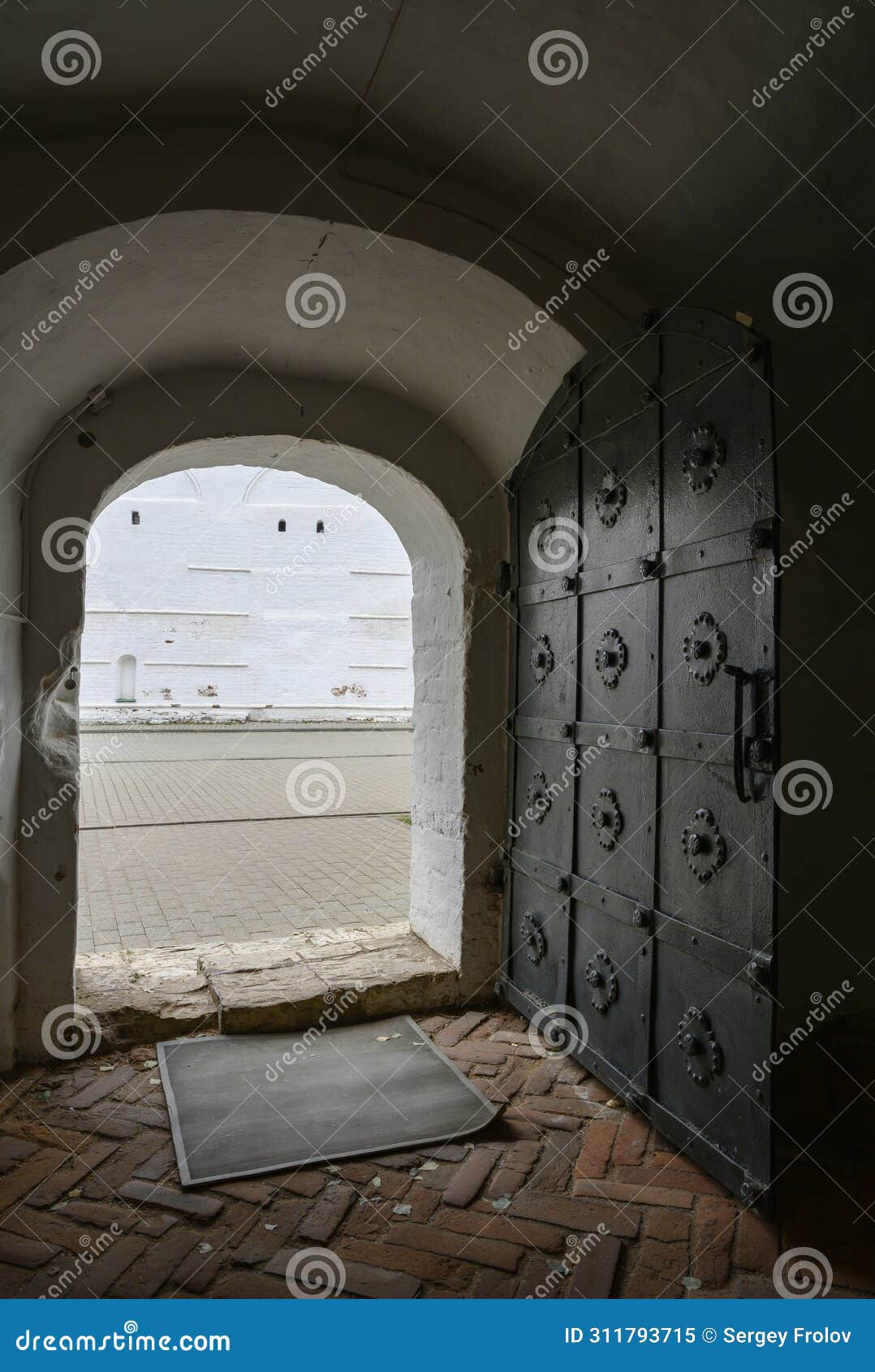 Exit To the Courtyard of a Medieval Monastery with an Arched Corridor ...