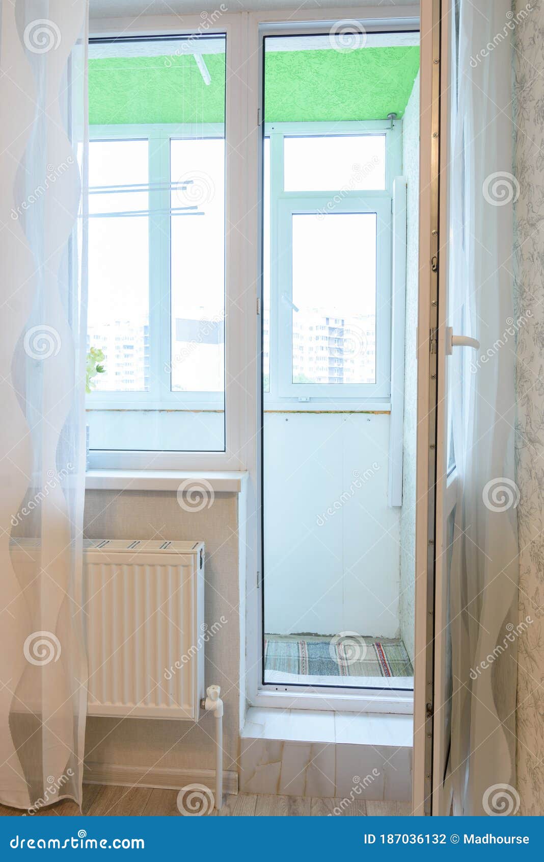 Exit To a Glazed Balcony from a Room in a Multi-storey Building Stock ...