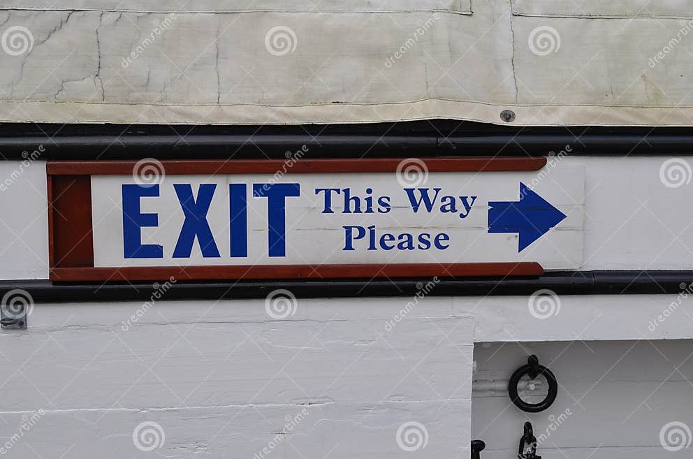 Exit this way please sign. stock image. Image of arrow - 49651793