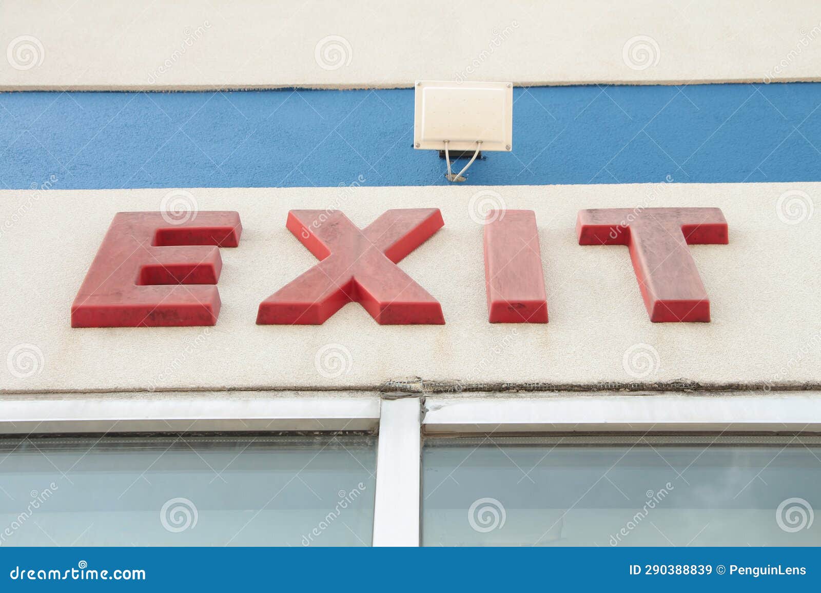 Exit Word Caption Writing Text in Red Sign on Building Wall Above ...