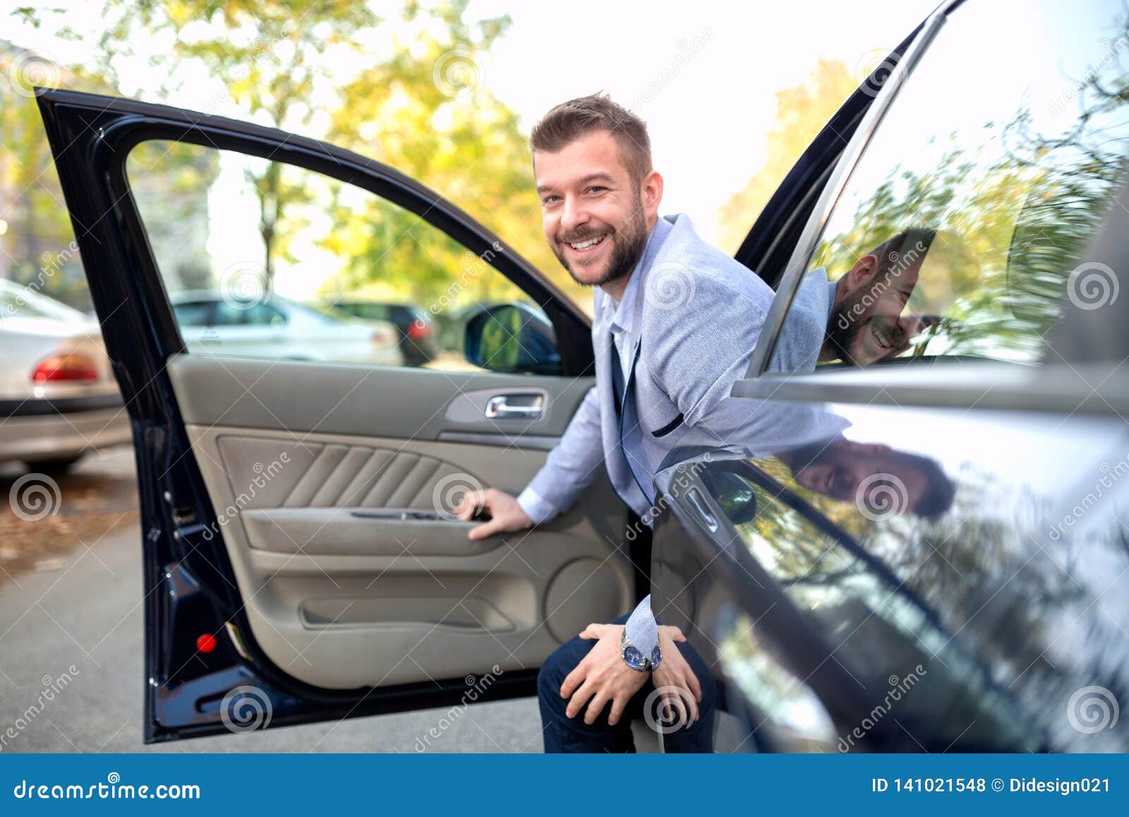 Exiting His Car with a Smile Stock Photo - Image of driver, road: 141021548