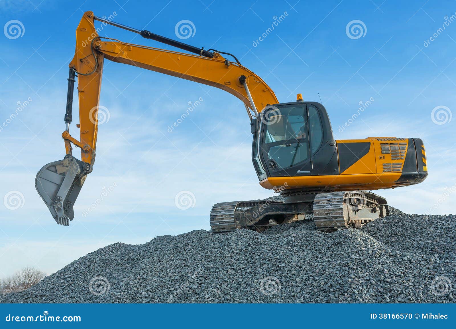 Exkavator on Big Pile of Gravel Stock Photo - Image of excavation ...