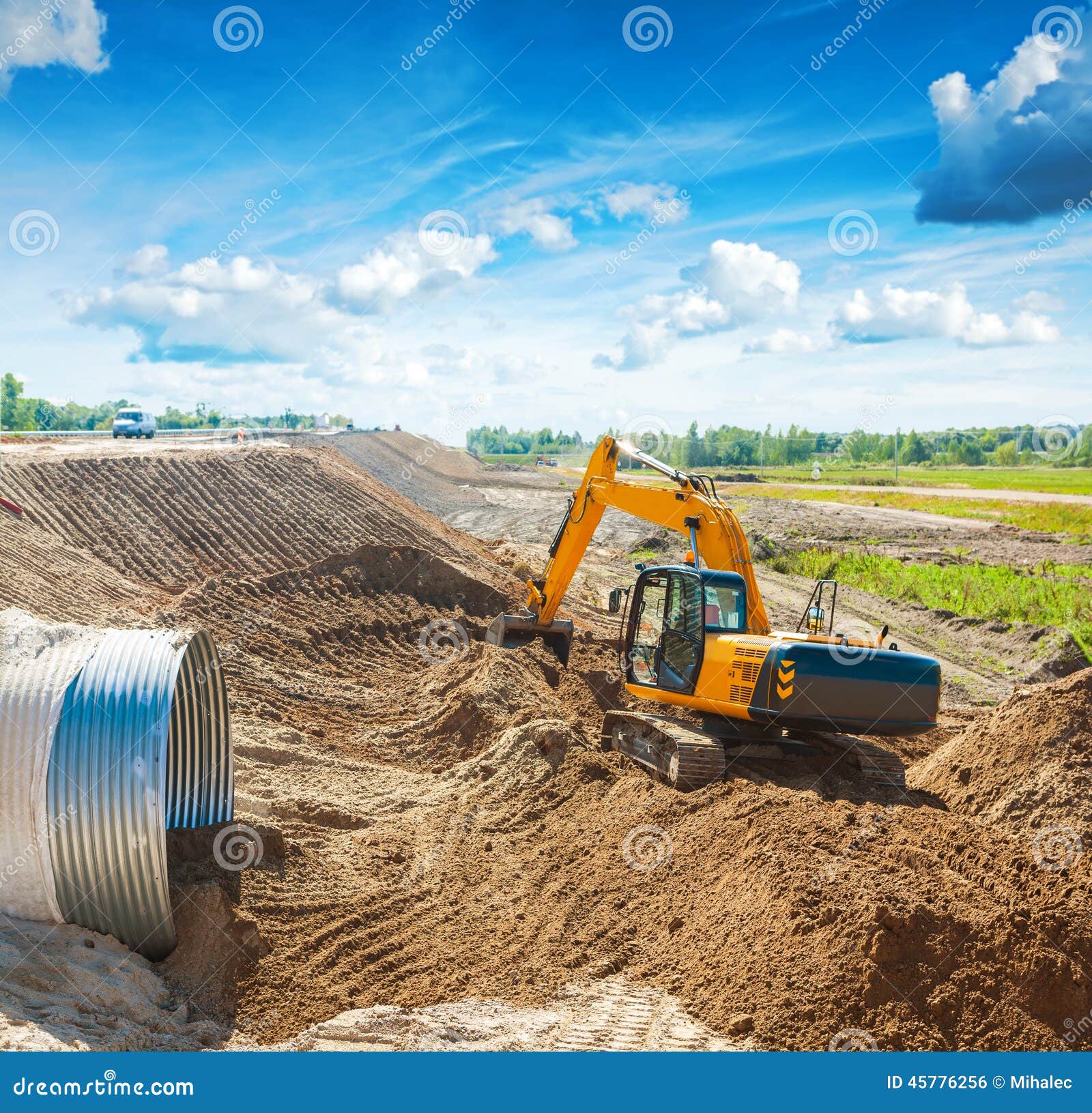 Exkavator Working on Construction Site Near the Road Stock Photo ...