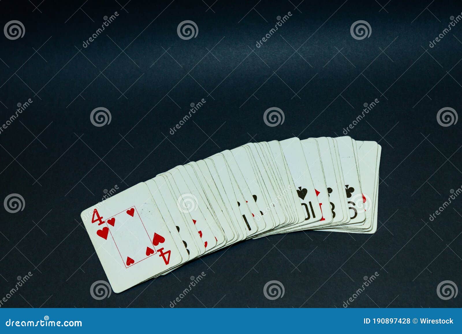 Expanded Playing Cards on Black Background Stock Photo - Image of ...