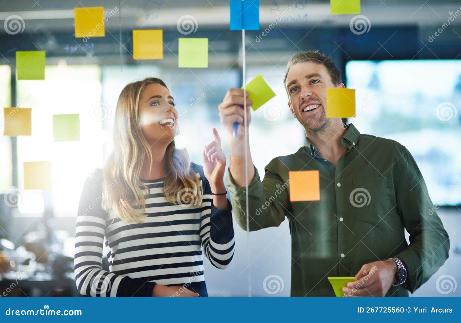 Expanding on a Great Idea. Colleagues Having a Brainstorming Session ...