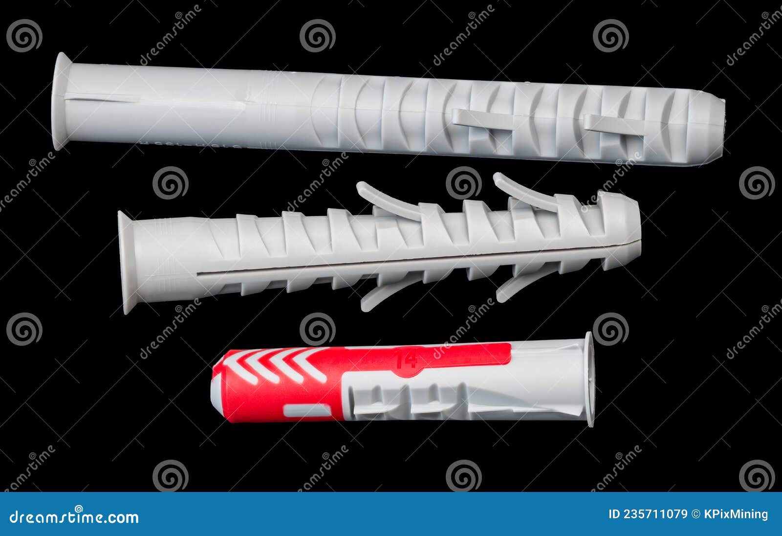 Set of Different Plastic Wall Plugs Isolated on a Black Background ...