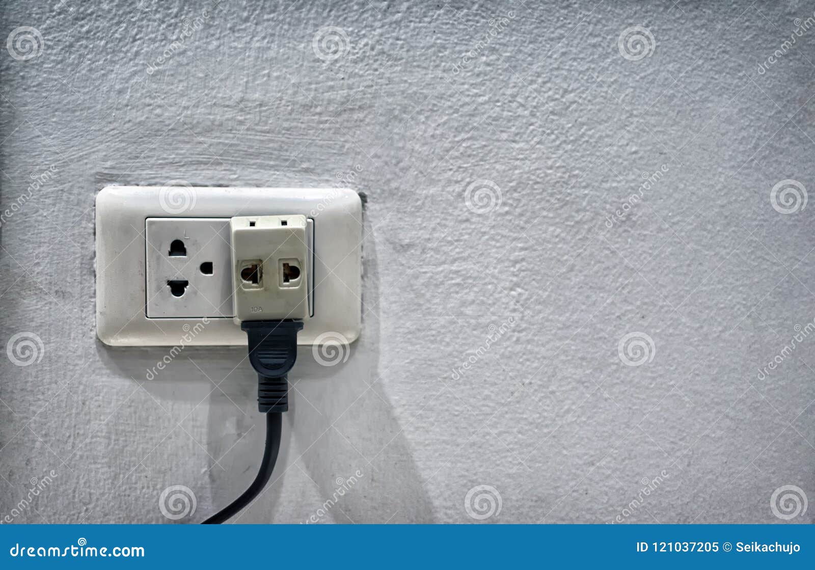 Expansion Electrical Plug Plugged into the Wall Socket Stock Image ...