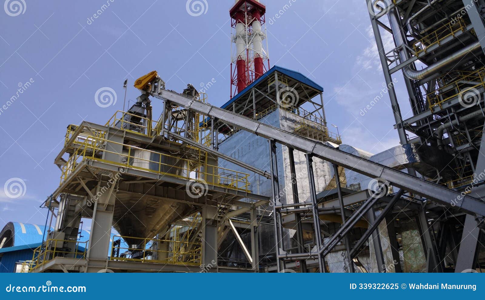 Industrial Processing Plant with Conveyor and Red-White Chimney Stock ...
