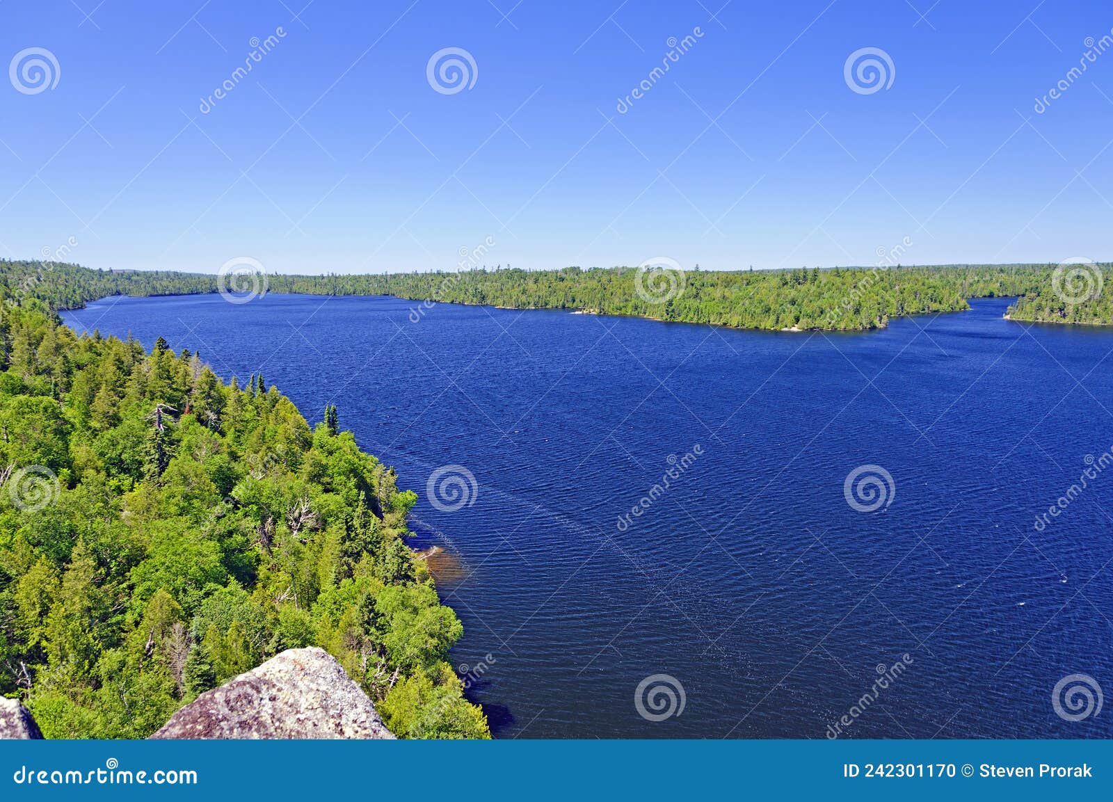 Expansive View from a Lake Shore Cliff Stock Photo - Image of ...