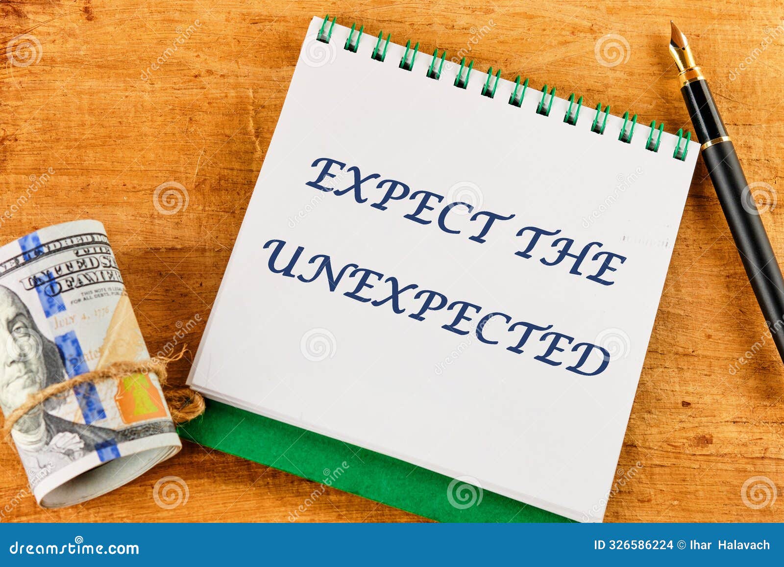 Expect the Unexpected Word on a Blank Sheet of Notepad Against a ...