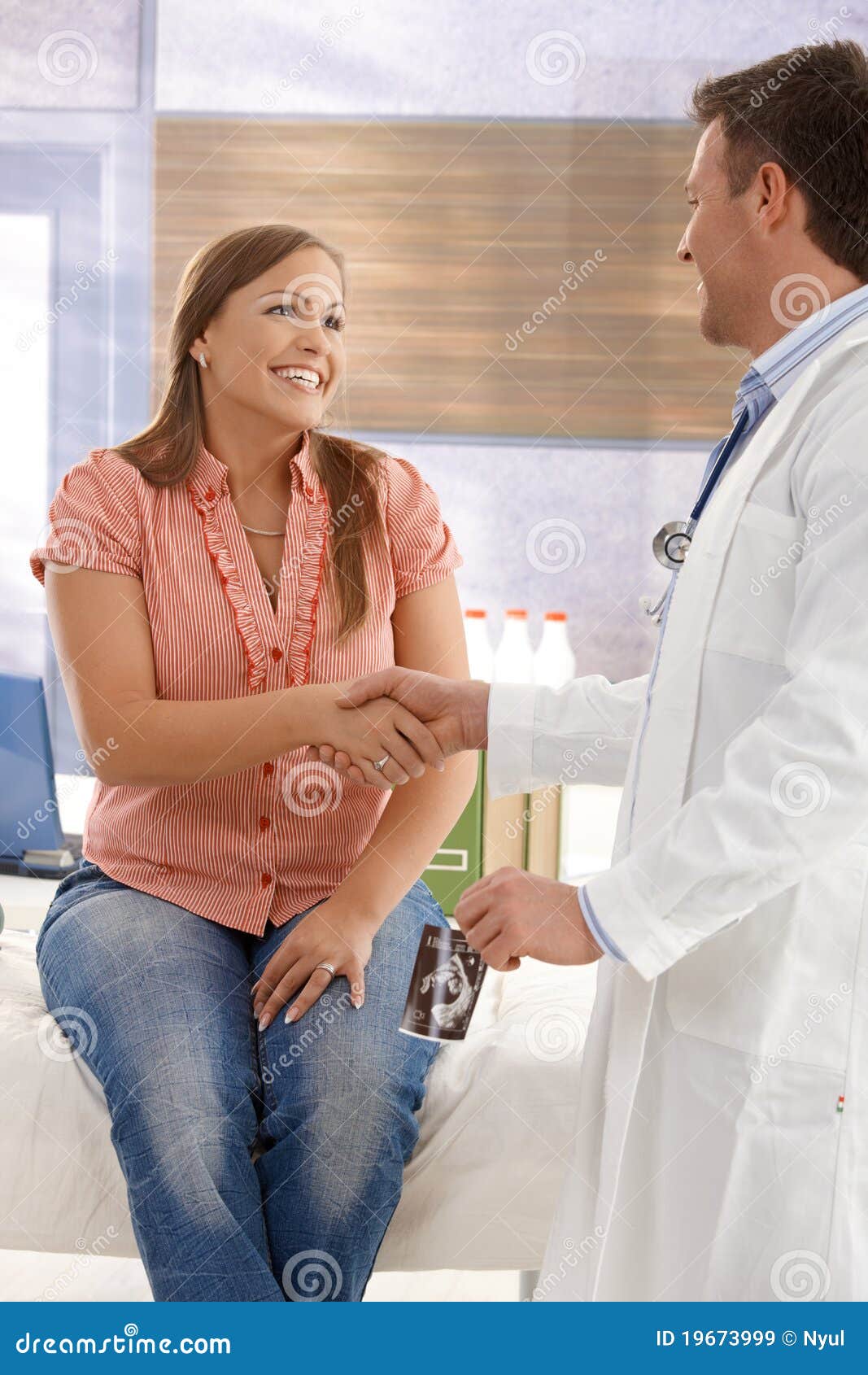 Expectant Mum Thanking Doctor Stock Image - Image of american, color ...