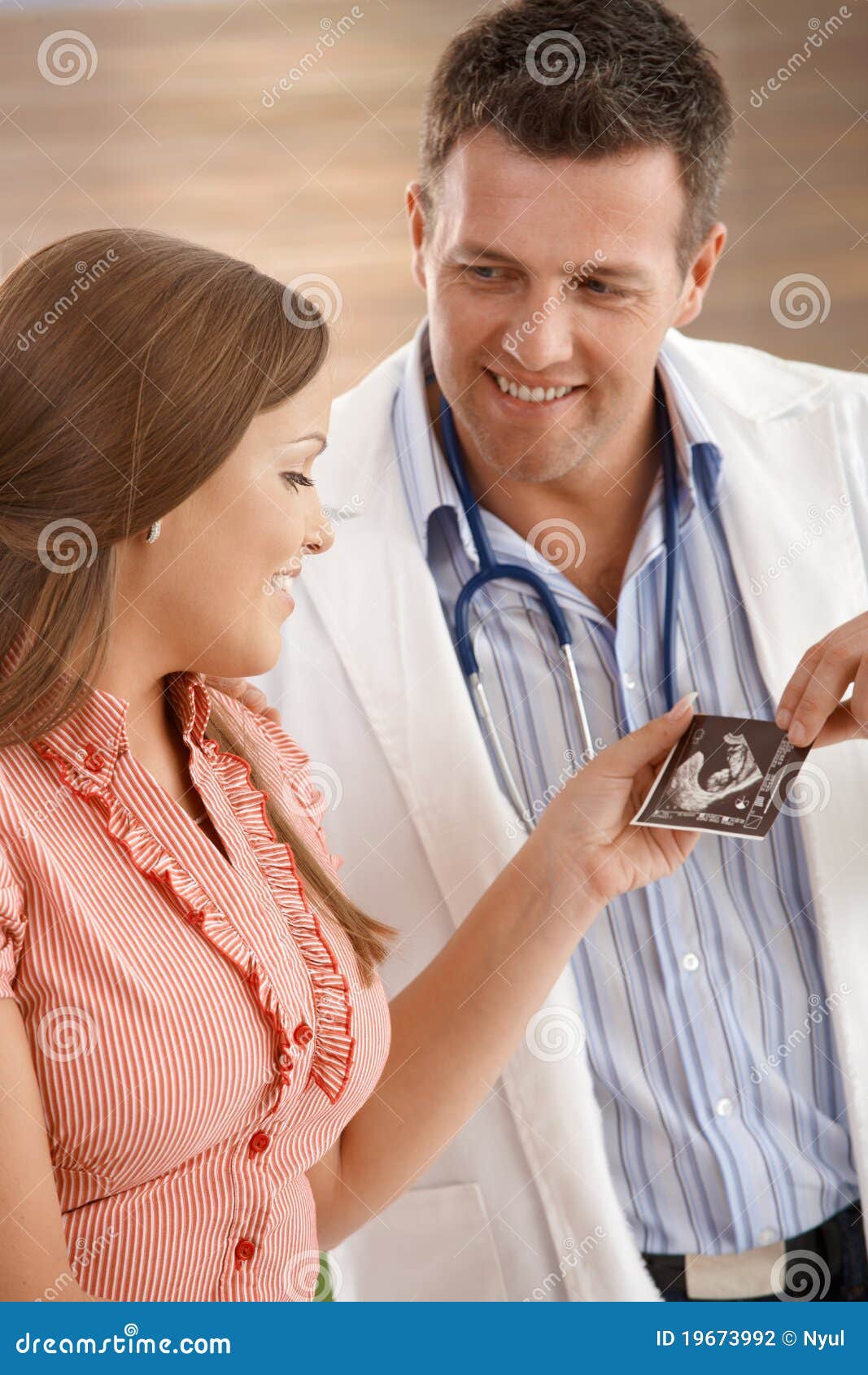 Expectant woman at doctor stock photo. Image of examination - 19673992