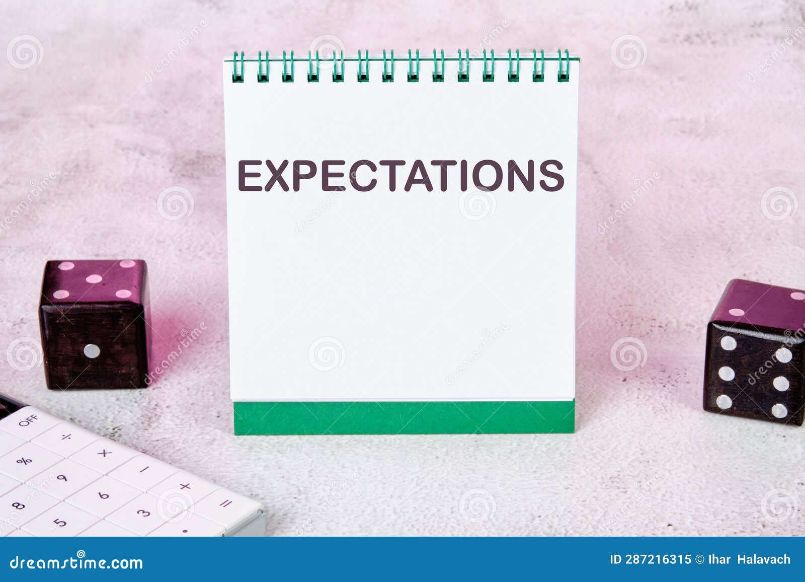 EXPECTATIONS Text on a White Notepad Sheet Next To Dice on an Abstract ...