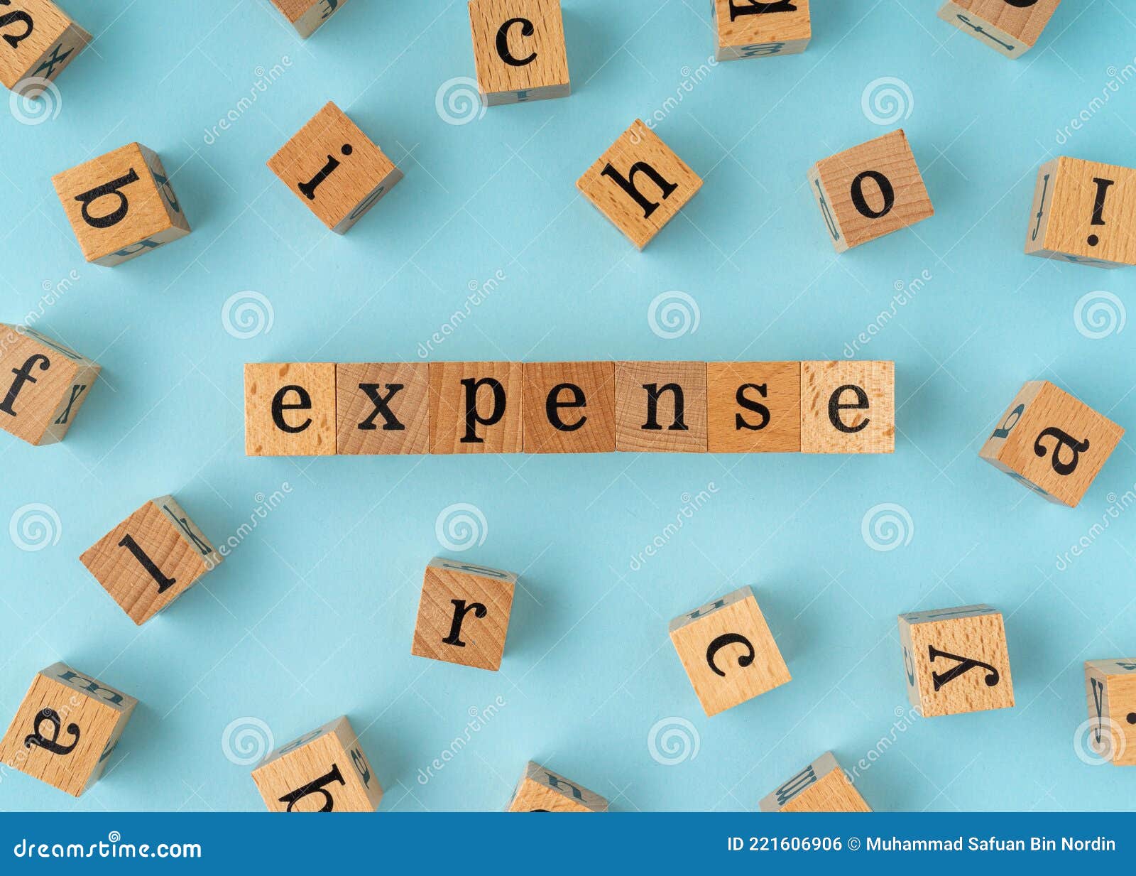 Expense Word on Wooden Block. Flat Lay View on Blue Background Stock ...