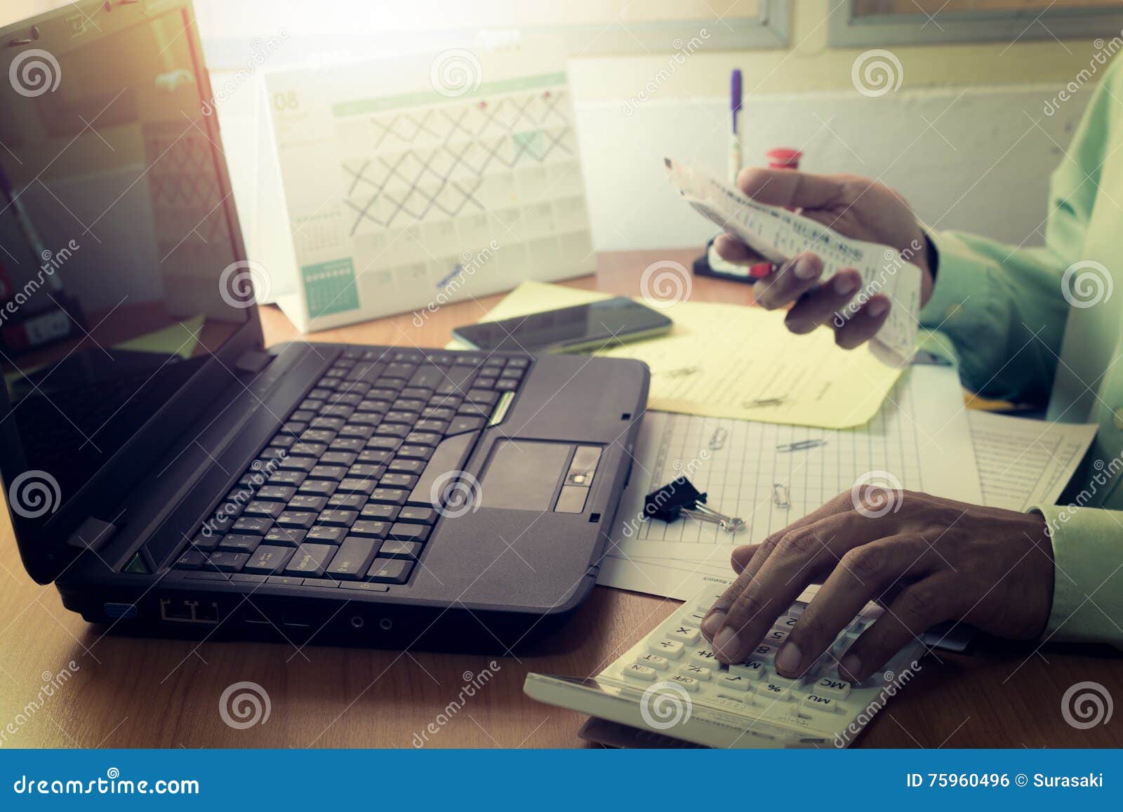 Expenses Calculation by a Man on Office Desk Stock Photo - Image of ...