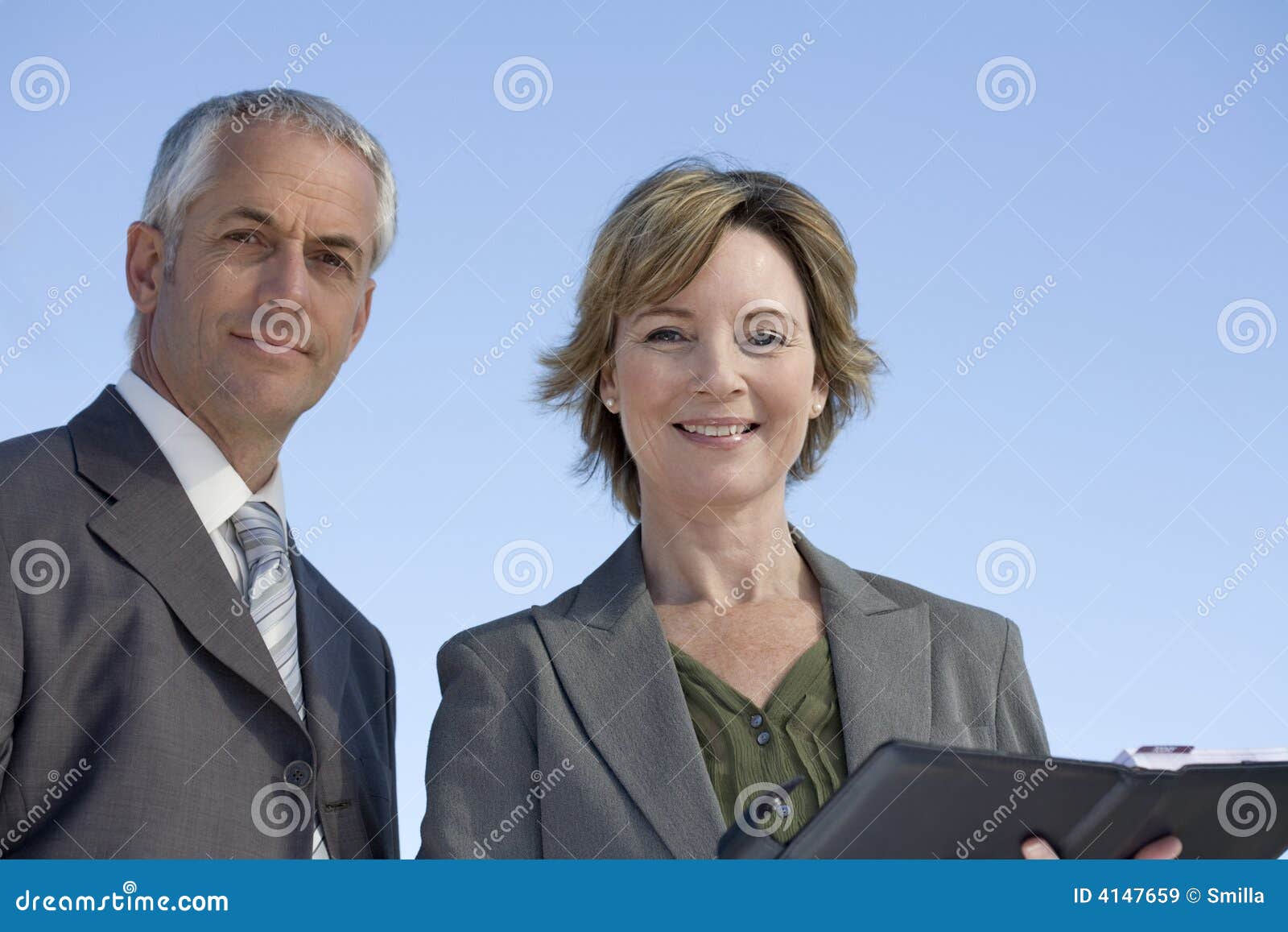 Experienced Business Couple on Location Stock Image - Image of office ...