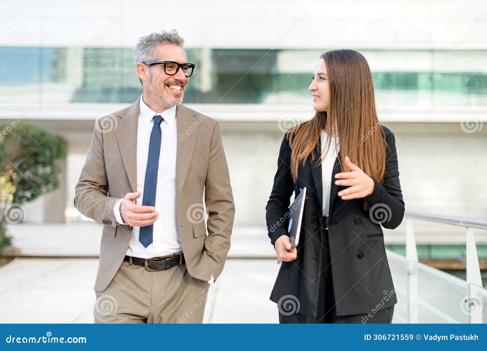 The Mature Businessman Engages in an Animated Discussion with His ...