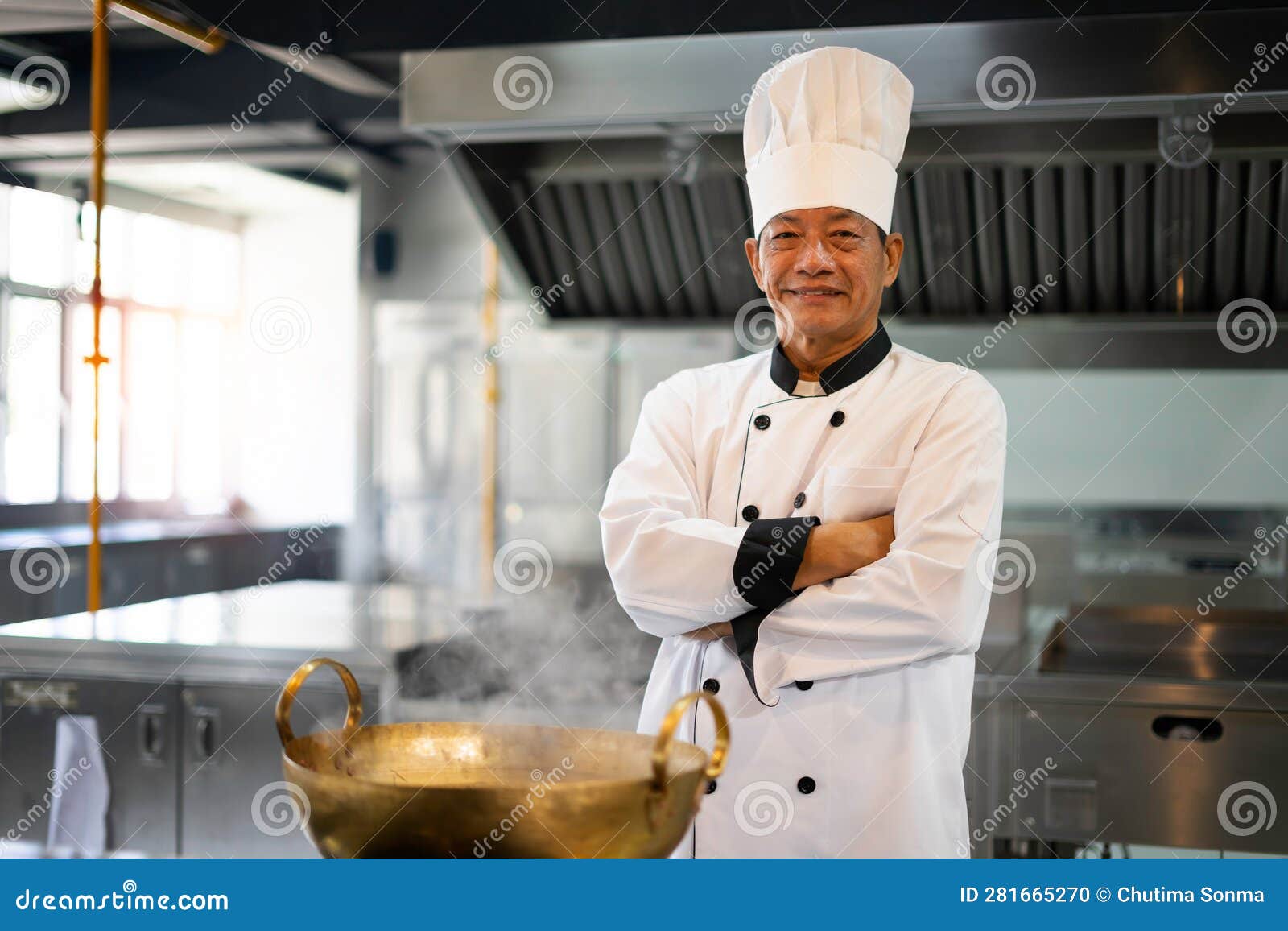 Experienced Chef is Cooking in a Large Kitchen Stock Photo - Image of ...