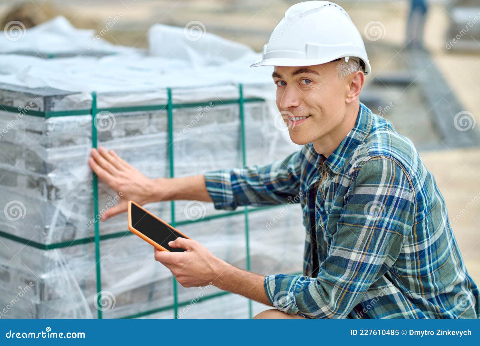 Experienced Construction Engineer Checking the Quality of Building ...