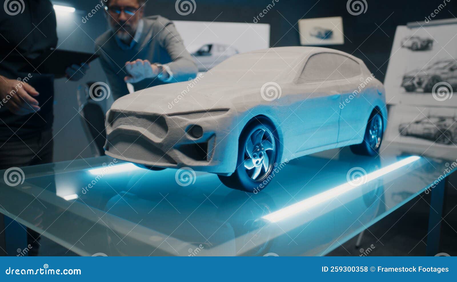 Experienced Designers Discuss the Car Design Infront of a Rake Sculpt ...