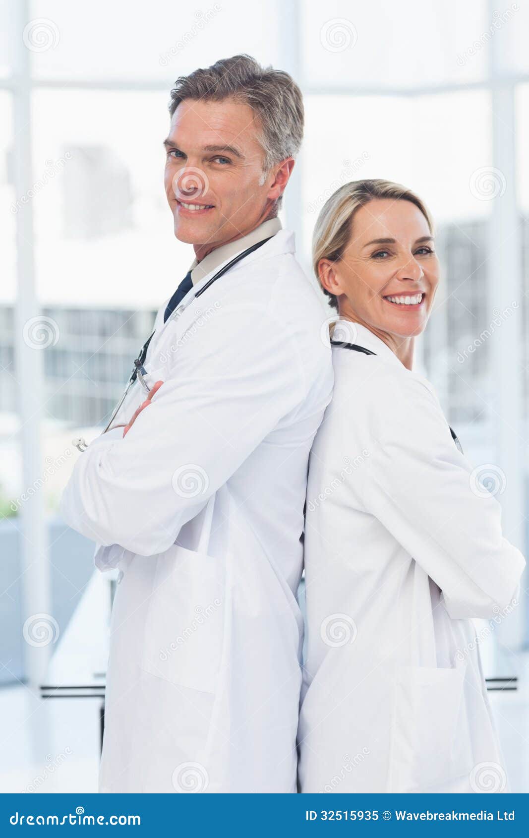 Experienced Doctors Posing Together Back To Back Stock Image - Image of ...
