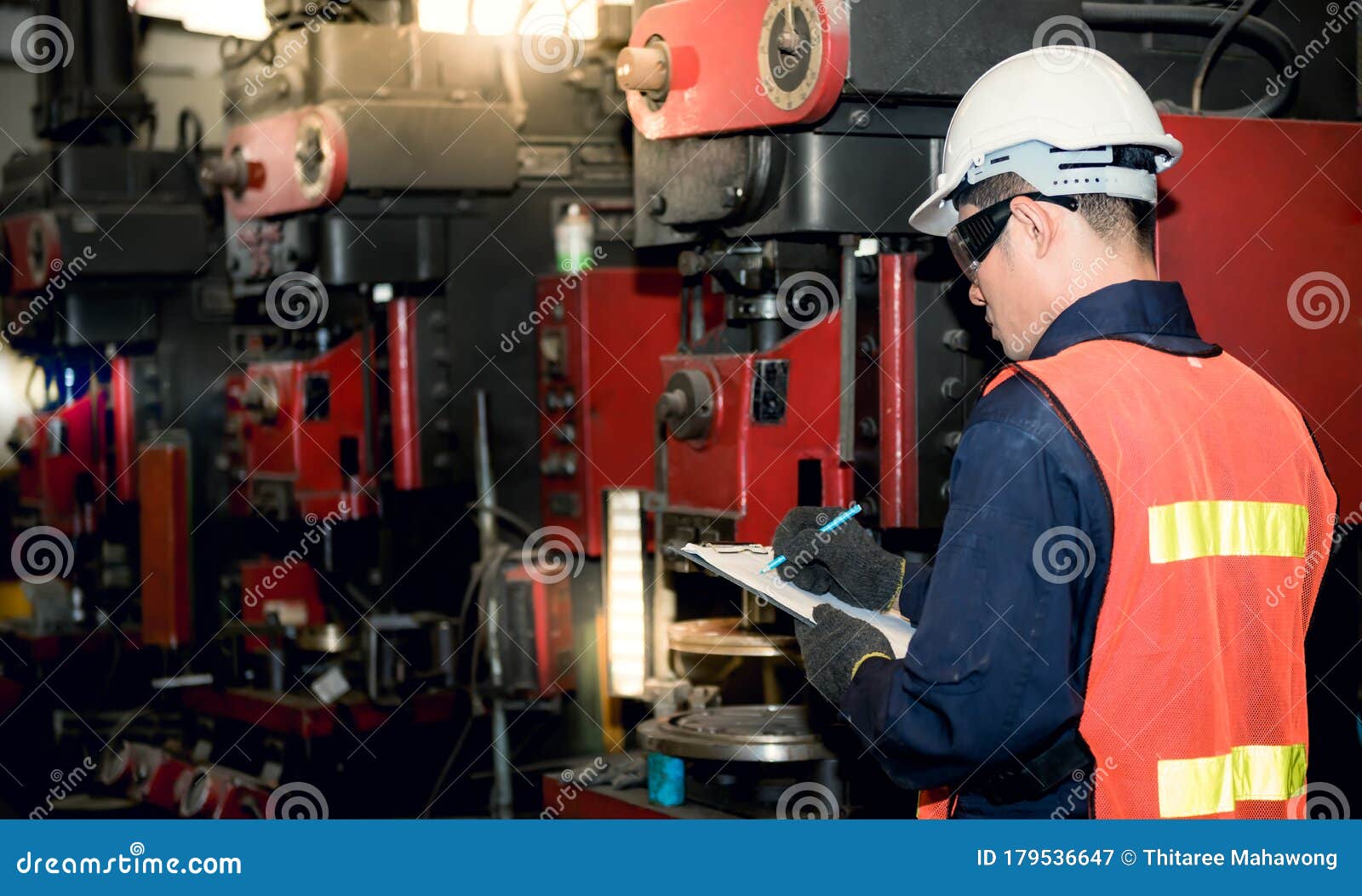 Experienced Entrepreneurs, Engineers Man is Writing a Maintenance ...