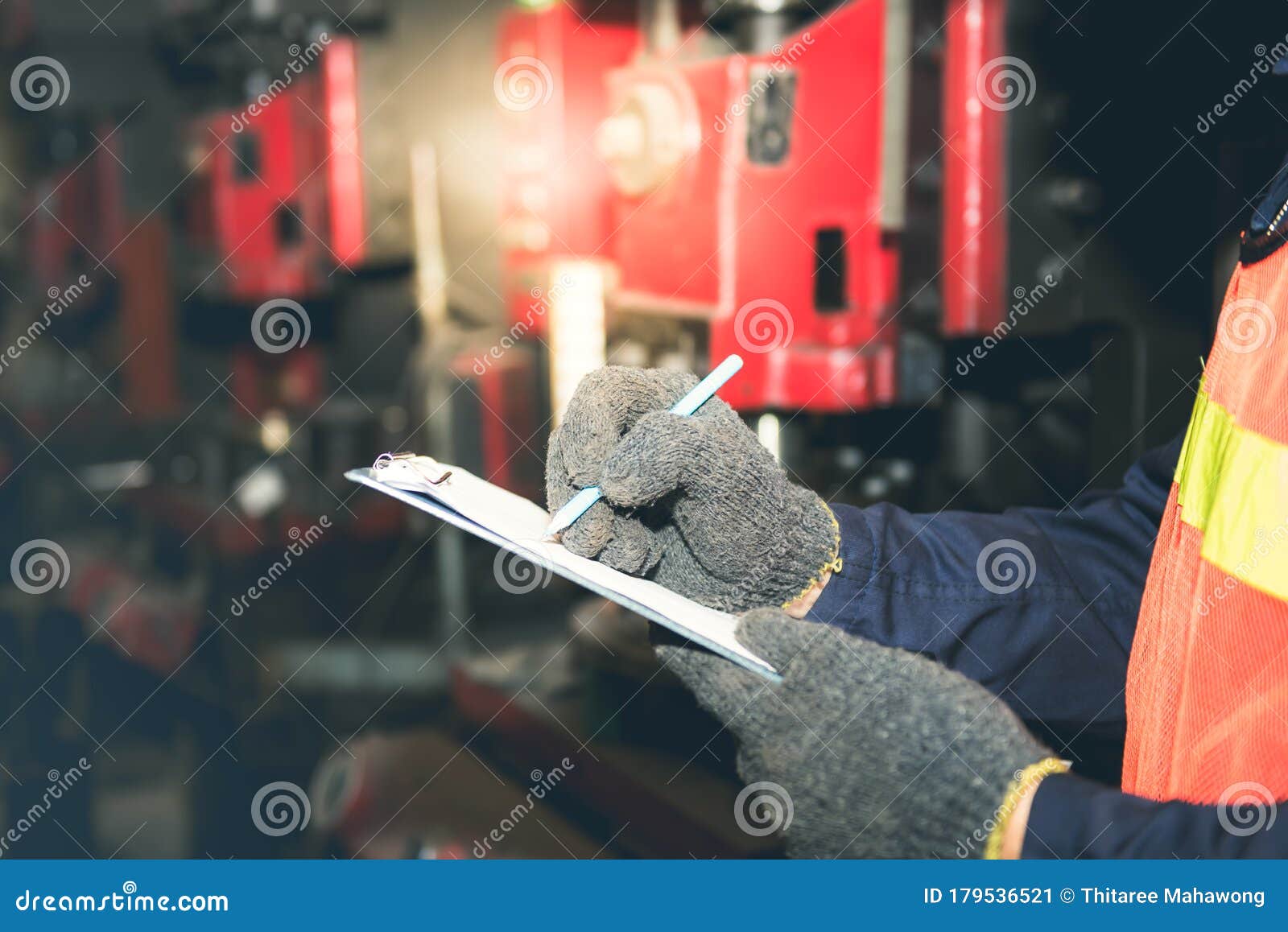 Engineers Man is Writing a Maintenance Report and the Performance Stock ...