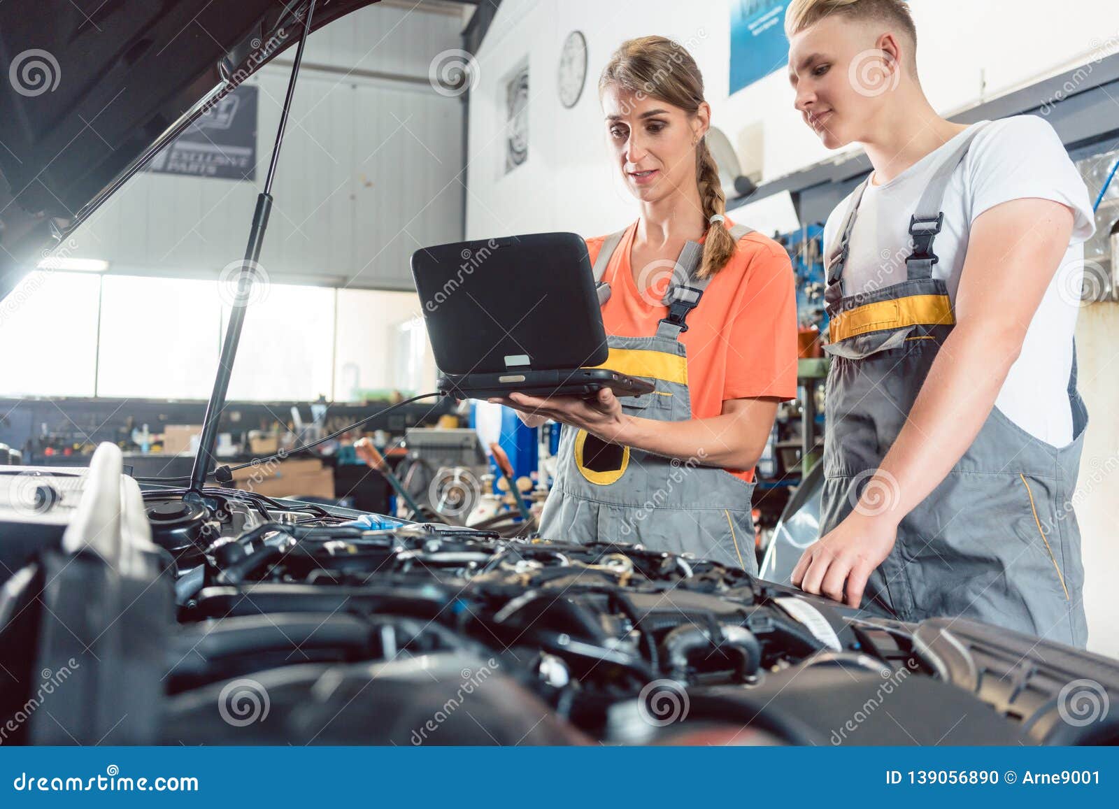 Car Mechanic Checking ECU Electronic Control Unit With OBD Or OBD2 ...