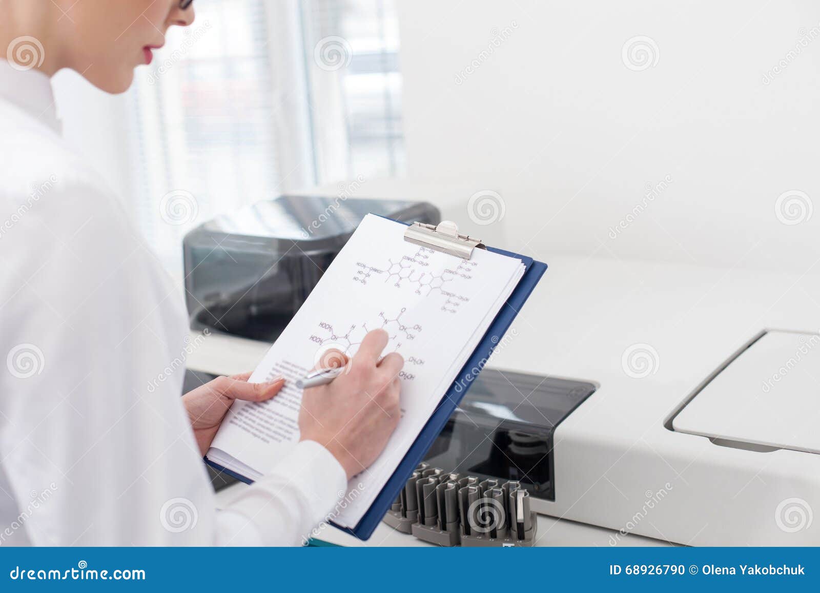 Experienced Female Researcher is Noting Her Finding Stock Photo - Image ...