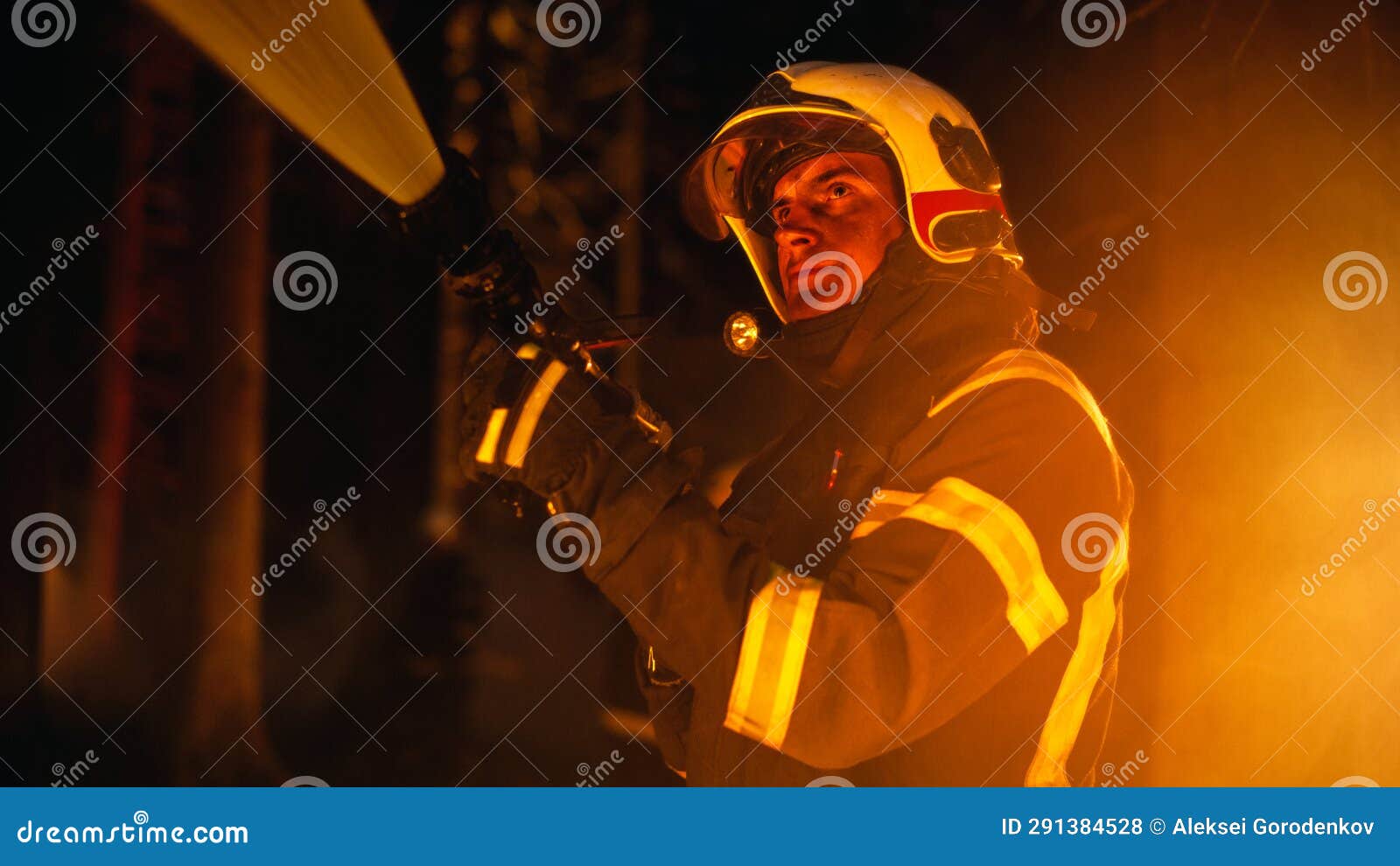 Experienced Firefighter Extinguishing a Wildland Fire Deep in a Forest ...