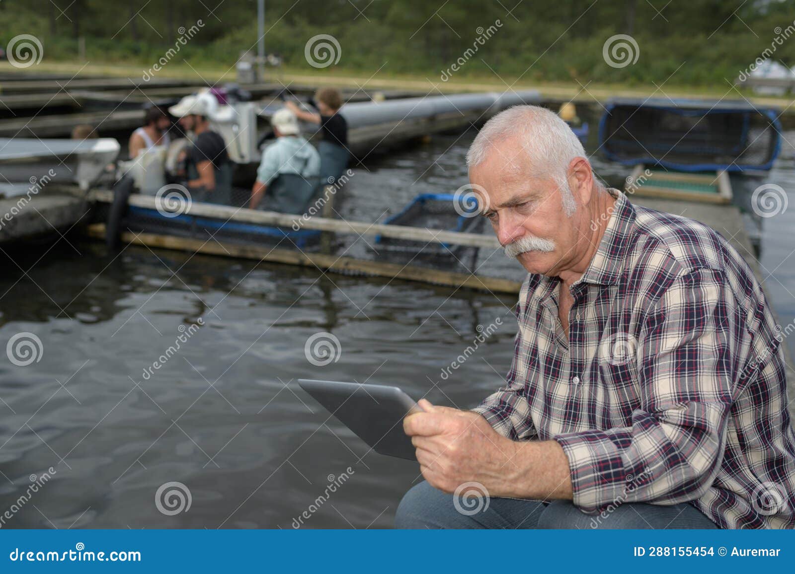 Experienced Fish Farm Manager Holding Tablet Stock Photo - Image of ...
