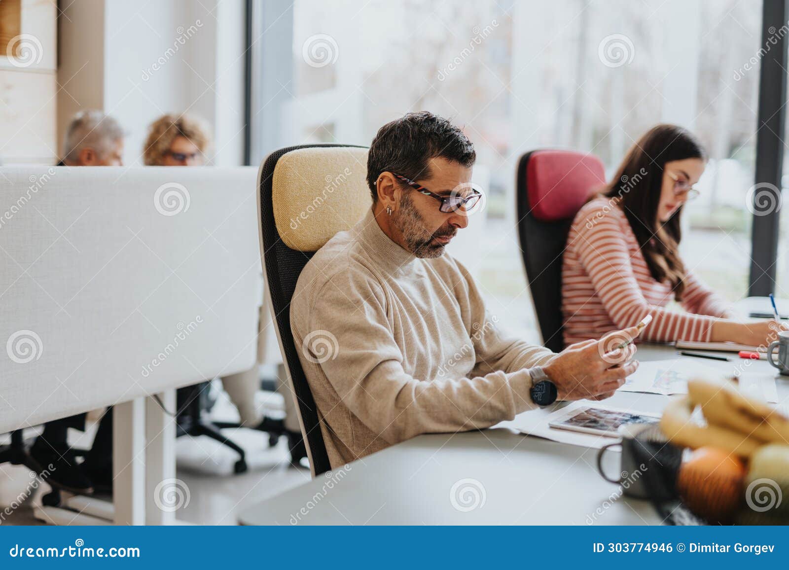 Experienced Group of Young Professionals Collaborating on a Successful ...