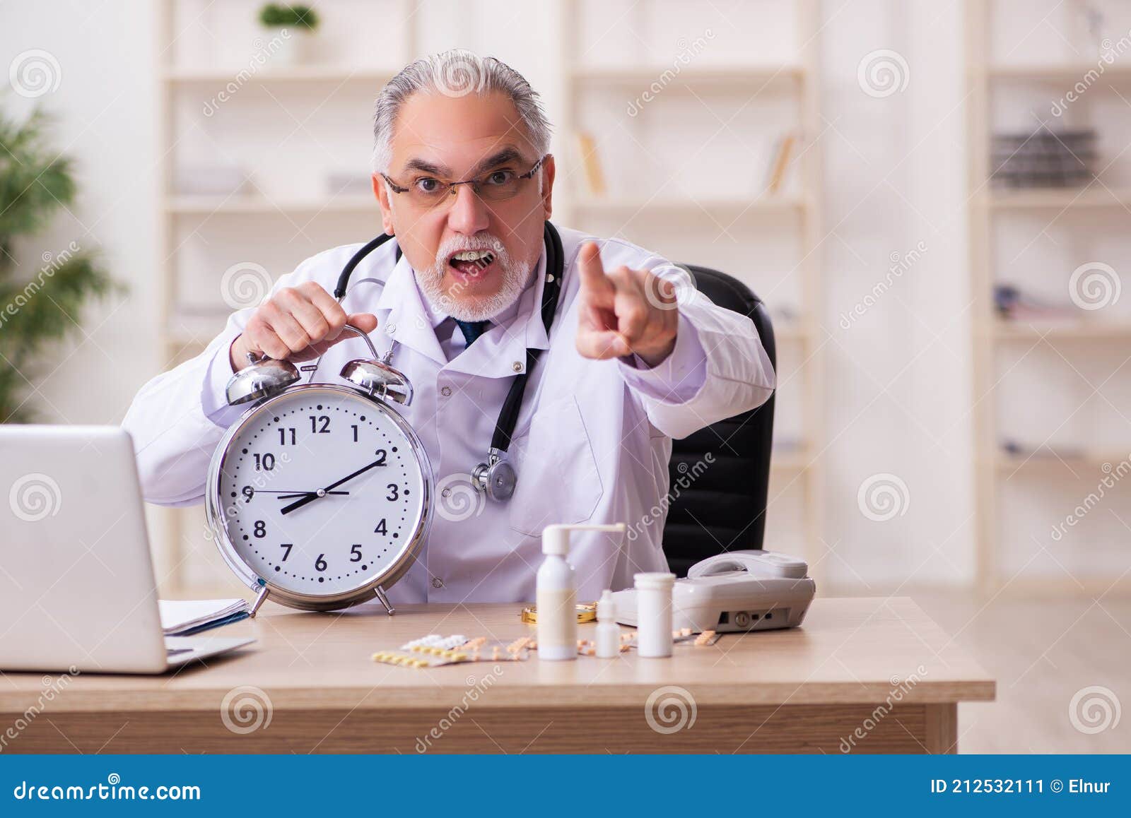 Experienced Male Doctor in Time Management Concept Stock Image - Image ...
