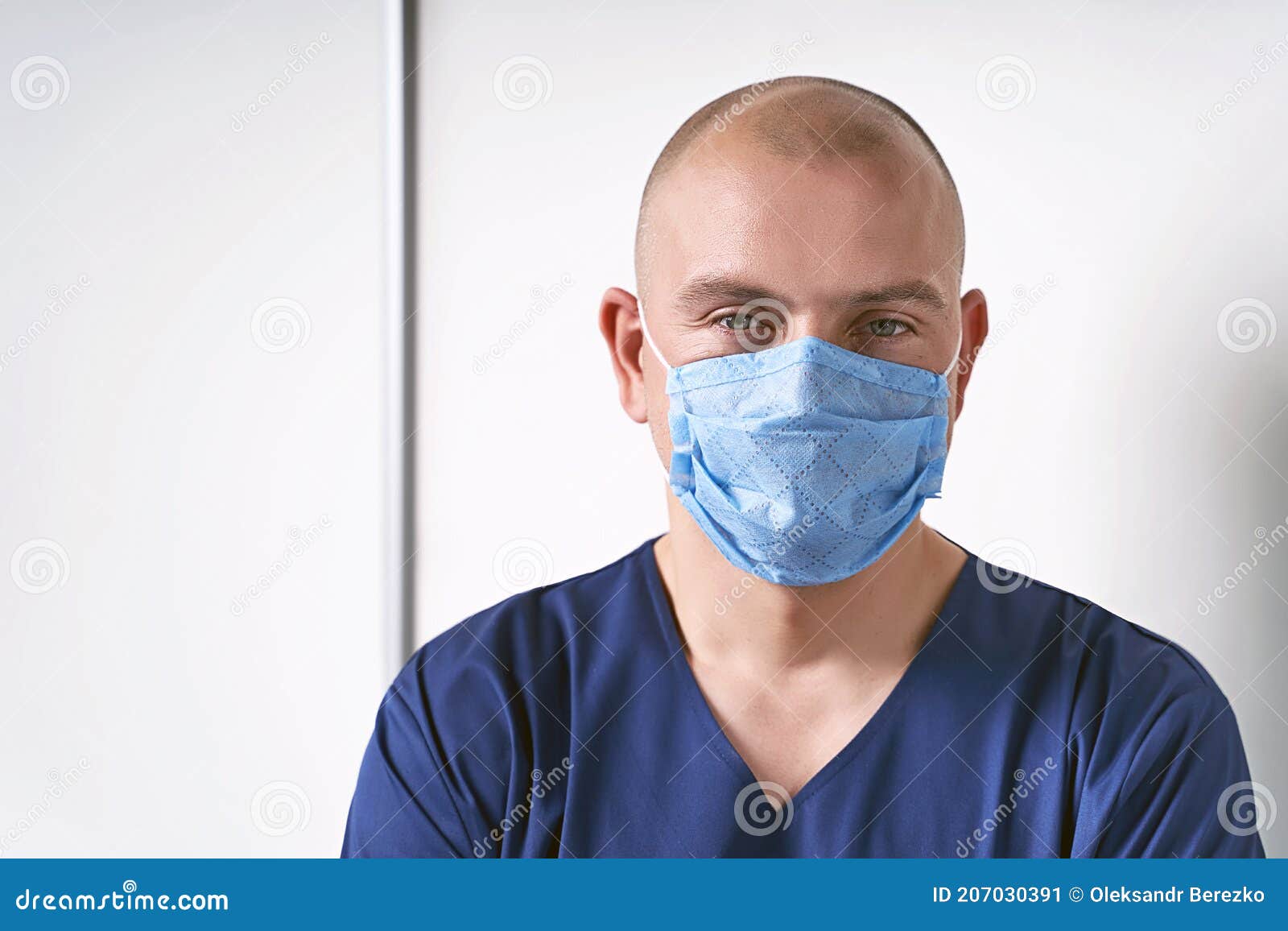 Experienced Male Massage Therapist Masseur In His Medical Office