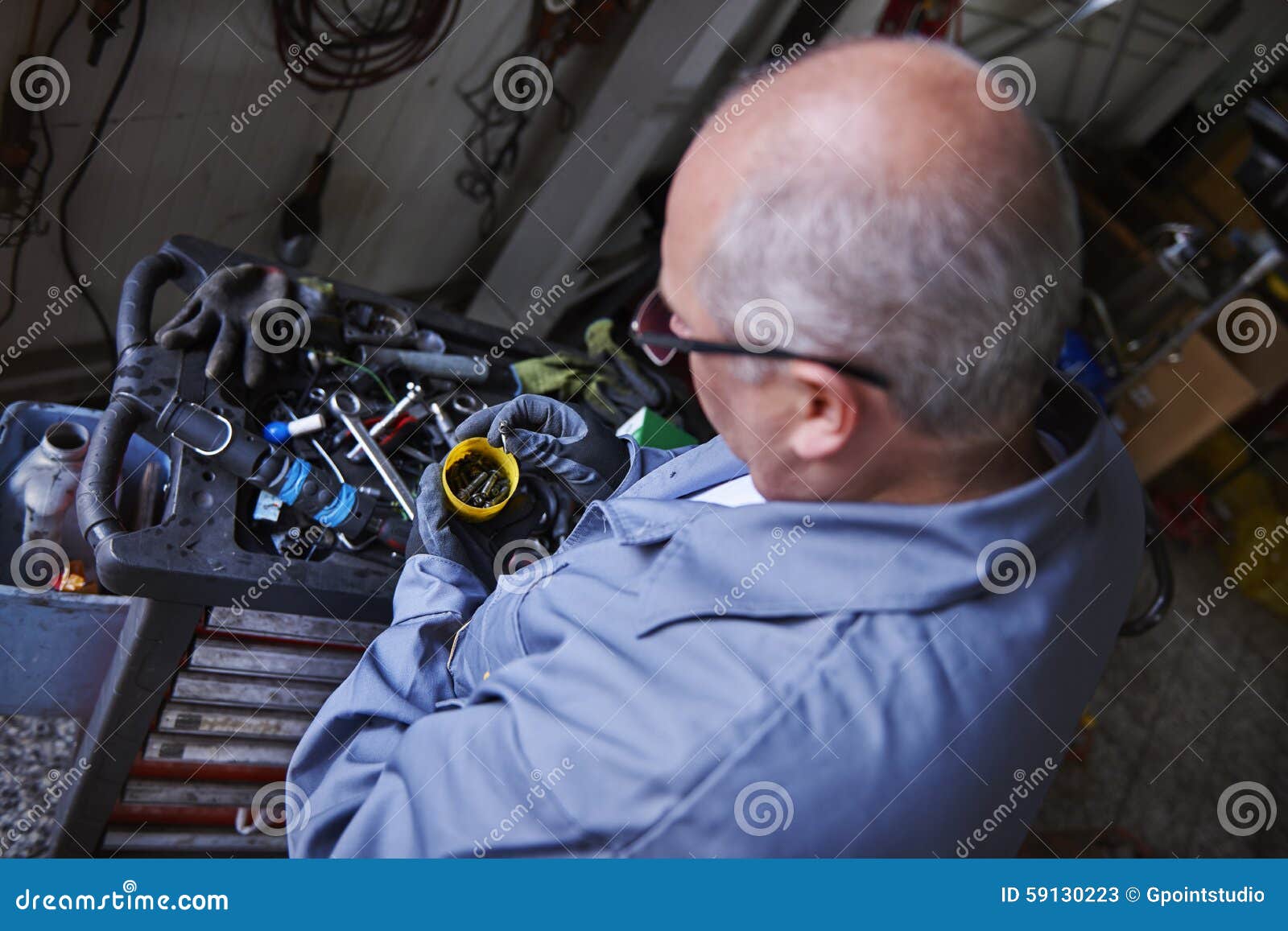 Experienced mechanic stock image. Image of eyeglasses - 59130223