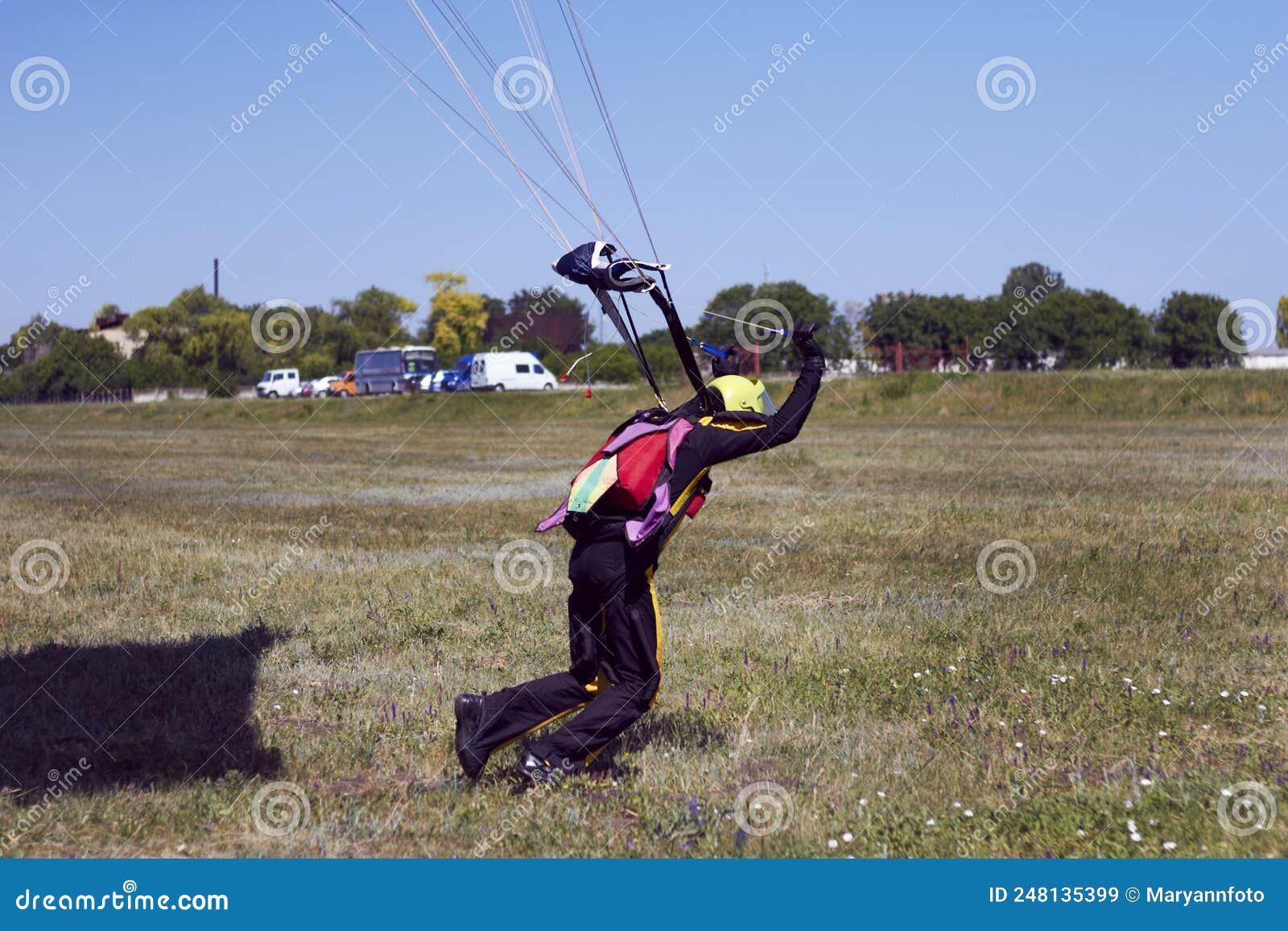 An Experienced Parachutist Landed Successfully and Pulls the Slings ...