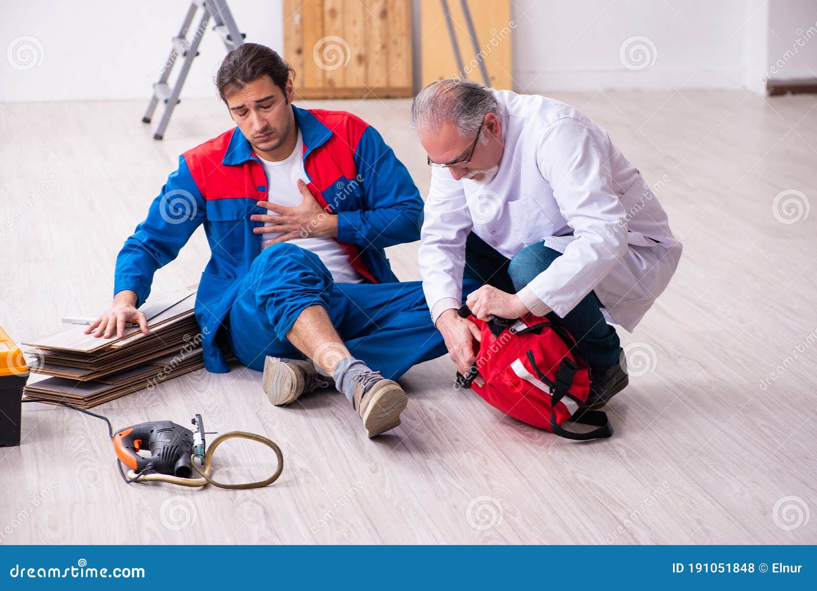 Experienced Paramedic Helping Workman Bitten by Snake Stock Photo ...
