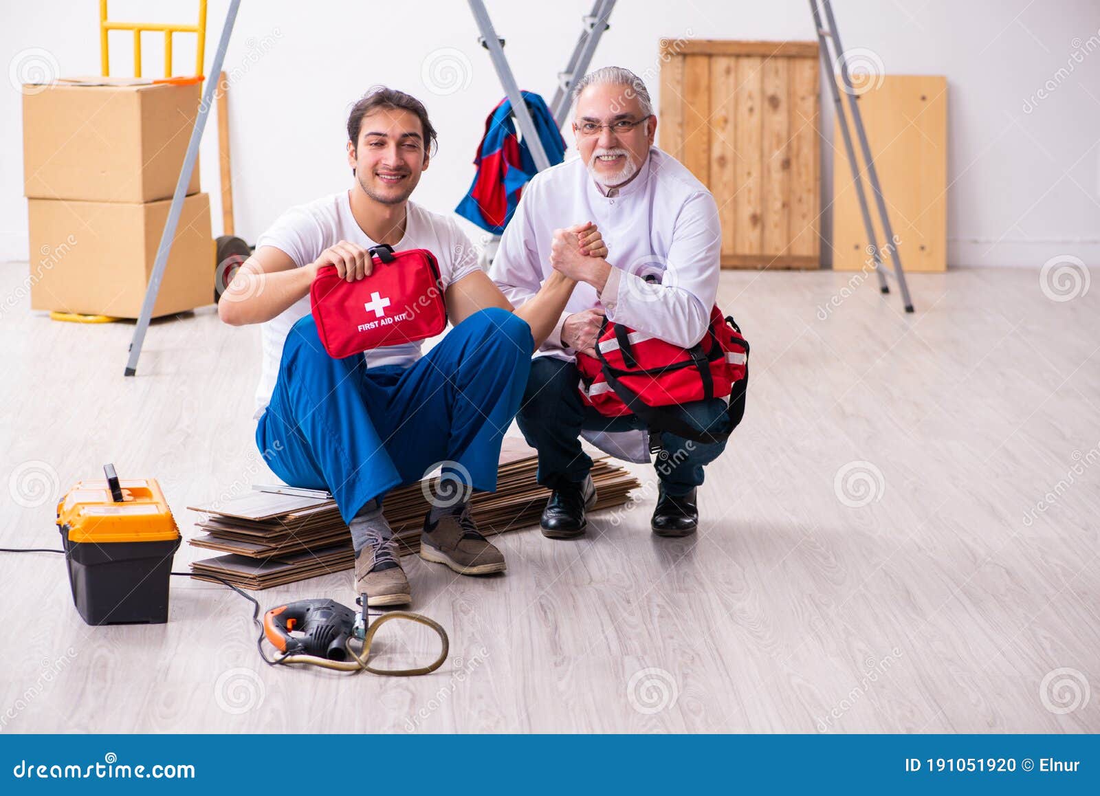 Experienced Paramedic Helping Workman Bitten by Snake Stock Photo ...