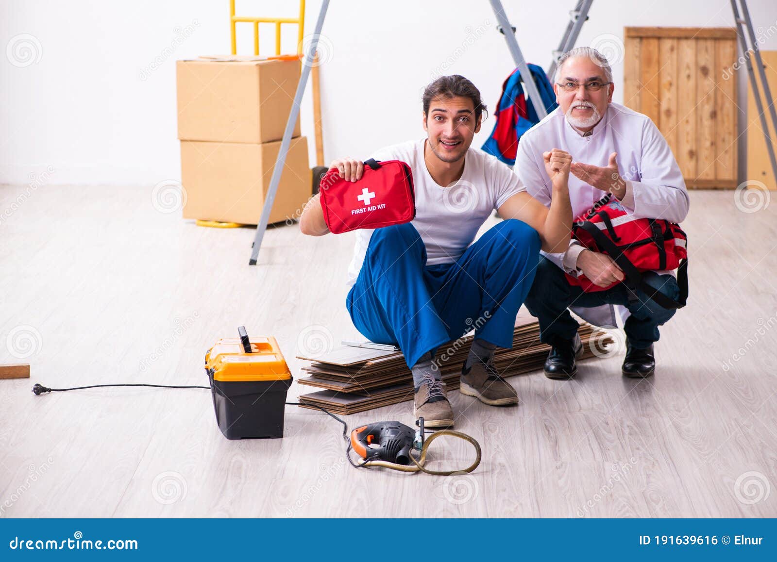 Experienced Paramedic Helping Workman Bitten by Snake Stock Photo ...