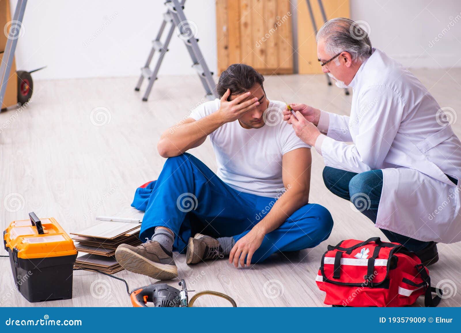 Experienced Paramedic Helping Workman Bitten by Snake Stock Image ...