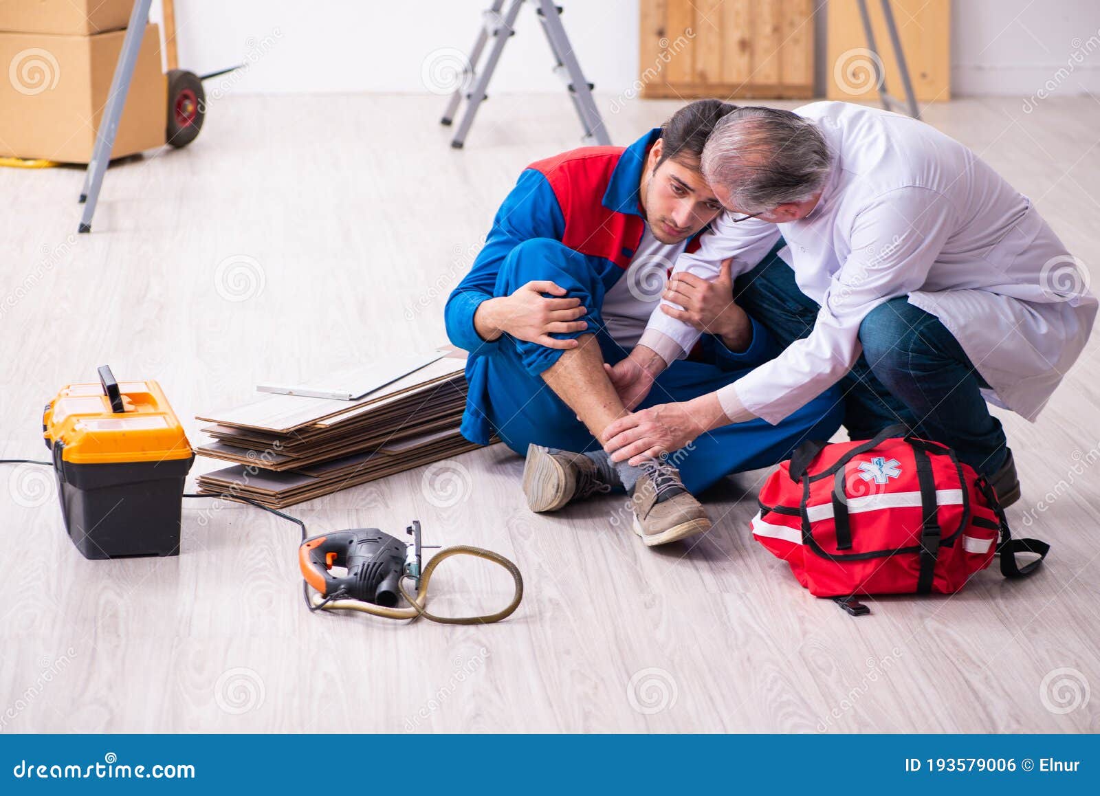 Experienced Paramedic Helping Workman Bitten by Snake Stock Photo ...