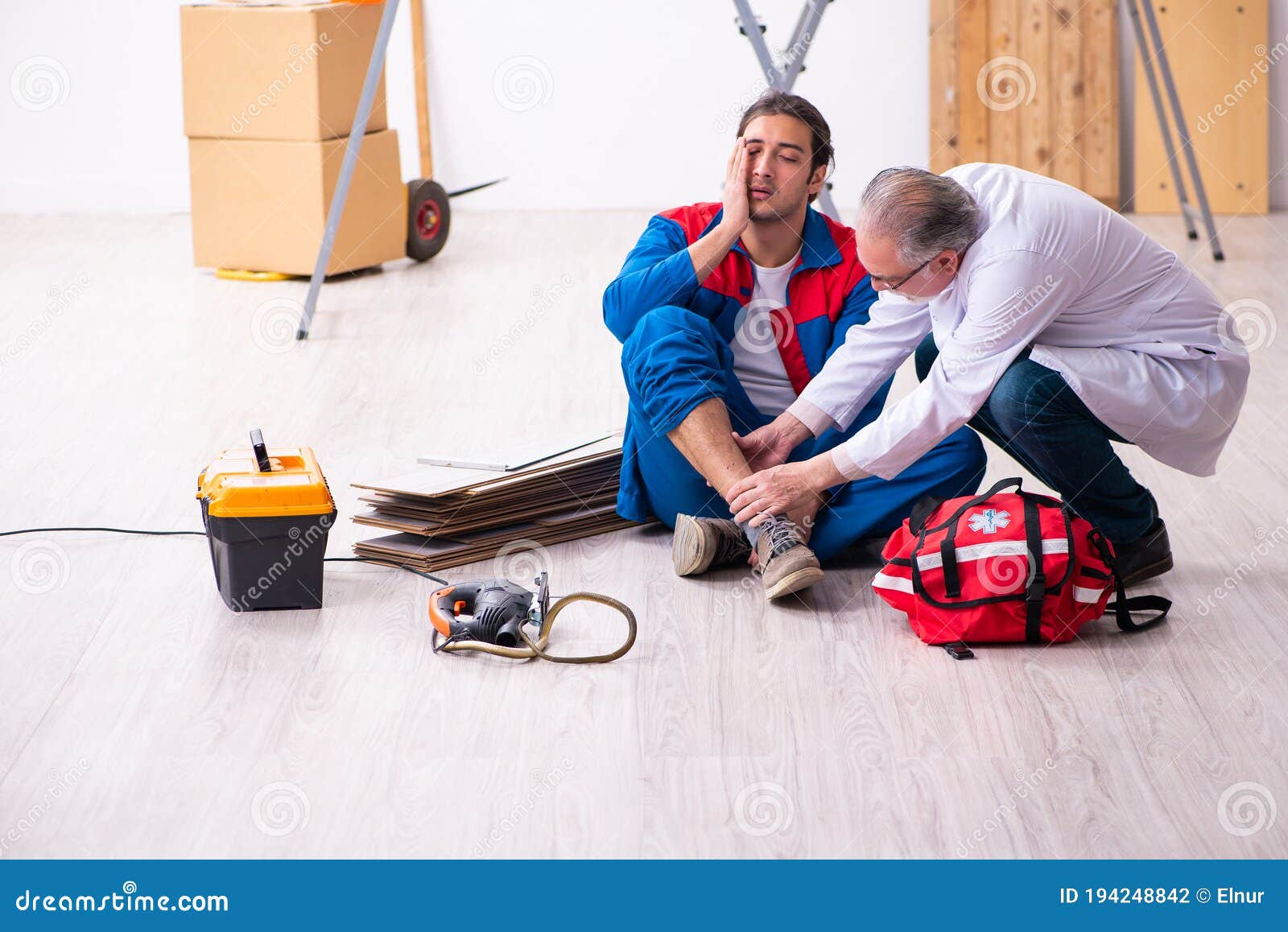 Experienced Paramedic Helping Workman Bitten by Snake Stock Photo ...