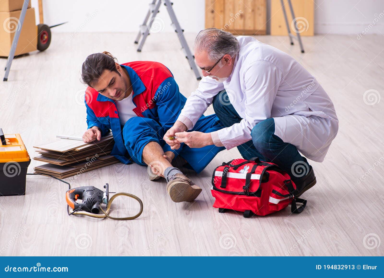Experienced Paramedic Helping Workman Bitten by Snake Stock Image ...