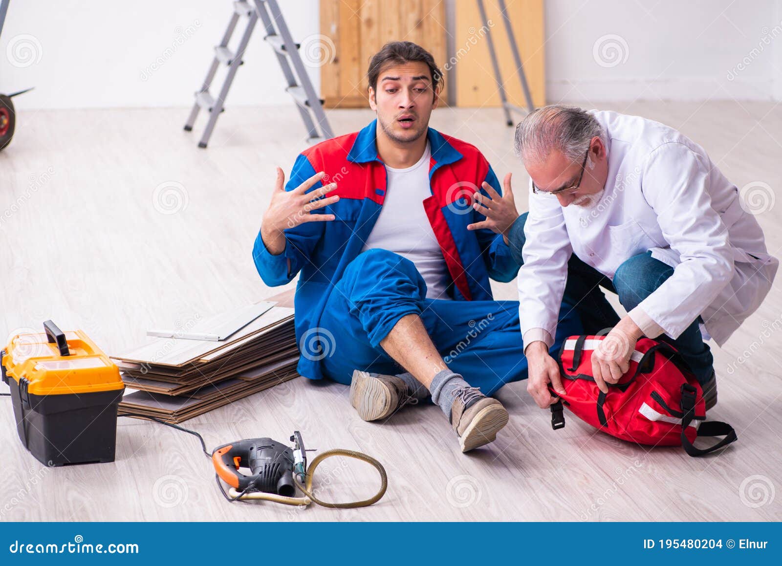 Experienced Paramedic Helping Workman Bitten by Snake Stock Photo ...
