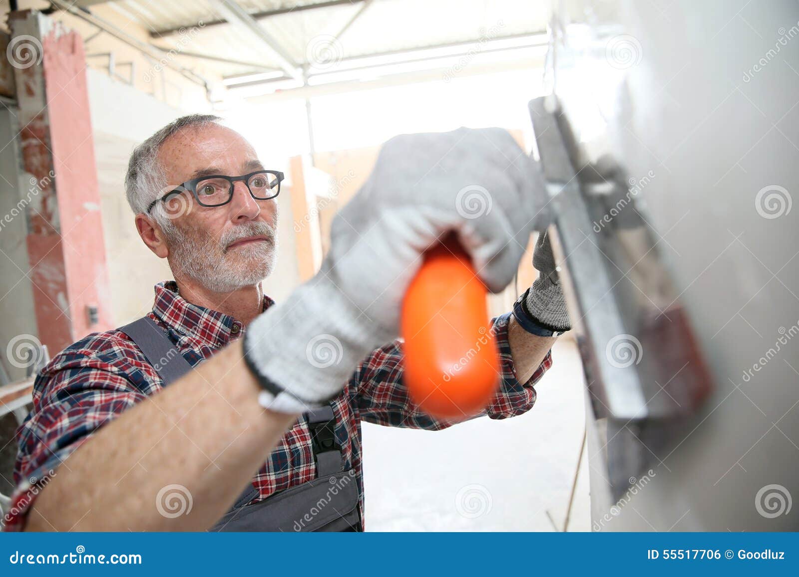 Experienced Plasterer Working on New Construction Wall Stock Photo ...