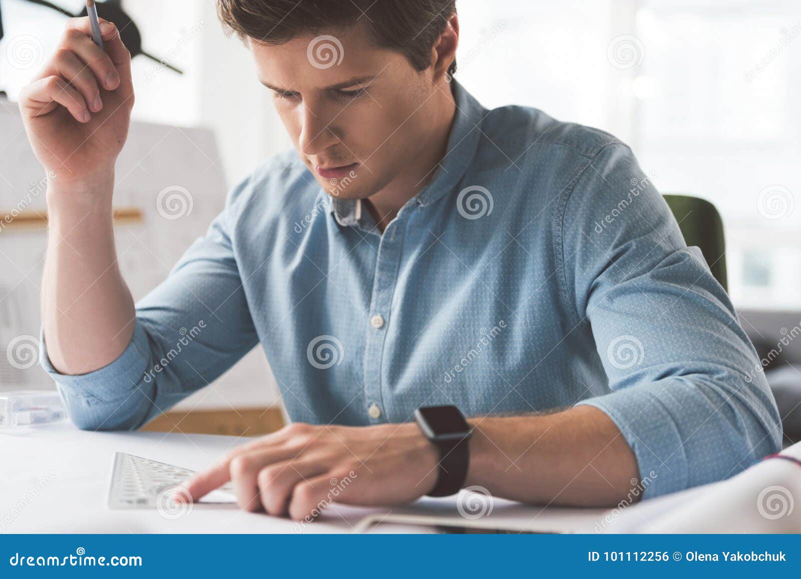 Experienced Pleasant Man is Laboring with Concentration Stock Photo ...
